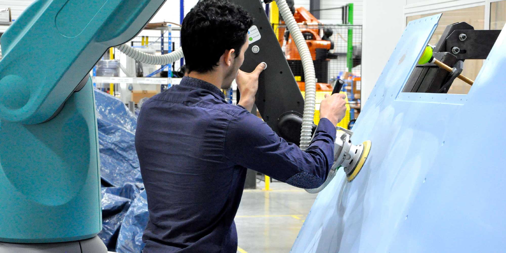 Collaborative robot for sanding operation of composite and metal - GEBE2